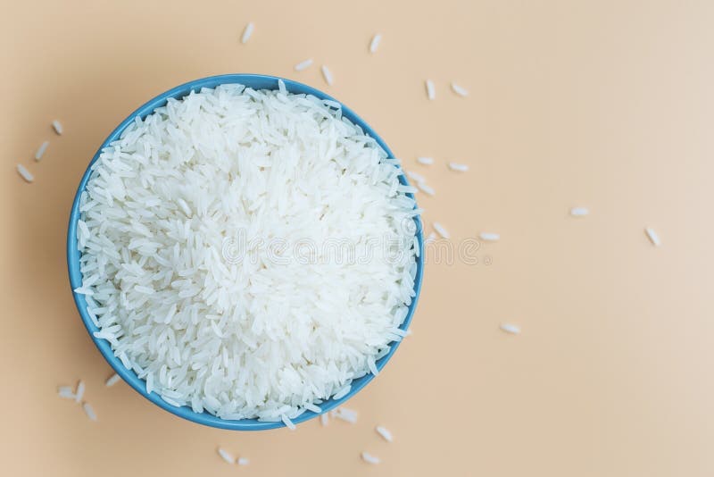 Bowl of Jasmine White Rice on Yellow Backgrounds Stock Photo - Image of ...