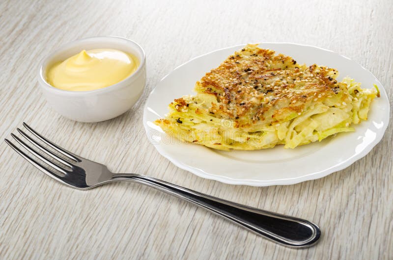 Bowl with Mayonnaise, Piece of Cabbage Flatbread in Plate, Fork on ...