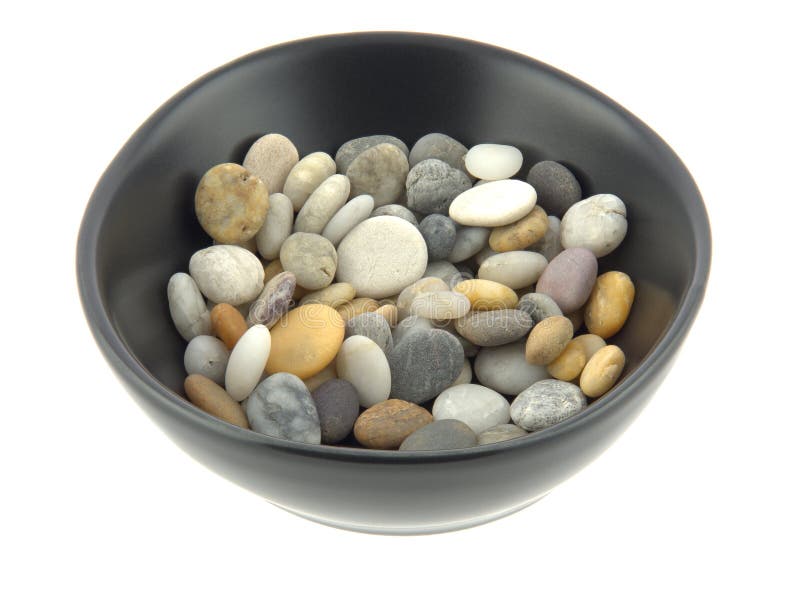 A Bowl of Mixed Beach Pebbles in Soft Light Stock Image - Image of ...