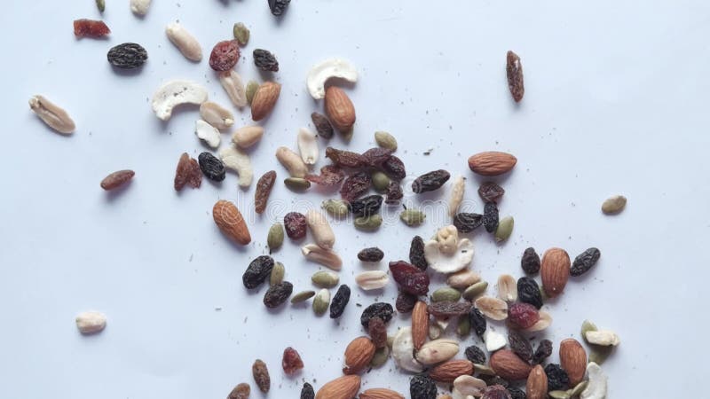 Slow Motion of Many Mixed Nuts Drops on White Background Stock Video ...