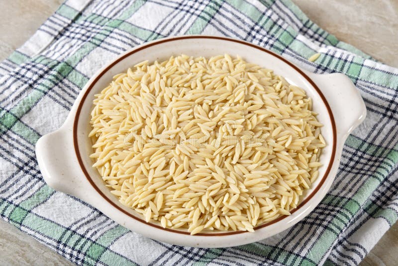Bowl of Orzo stock image. Image of bowl, preperation - 127093443