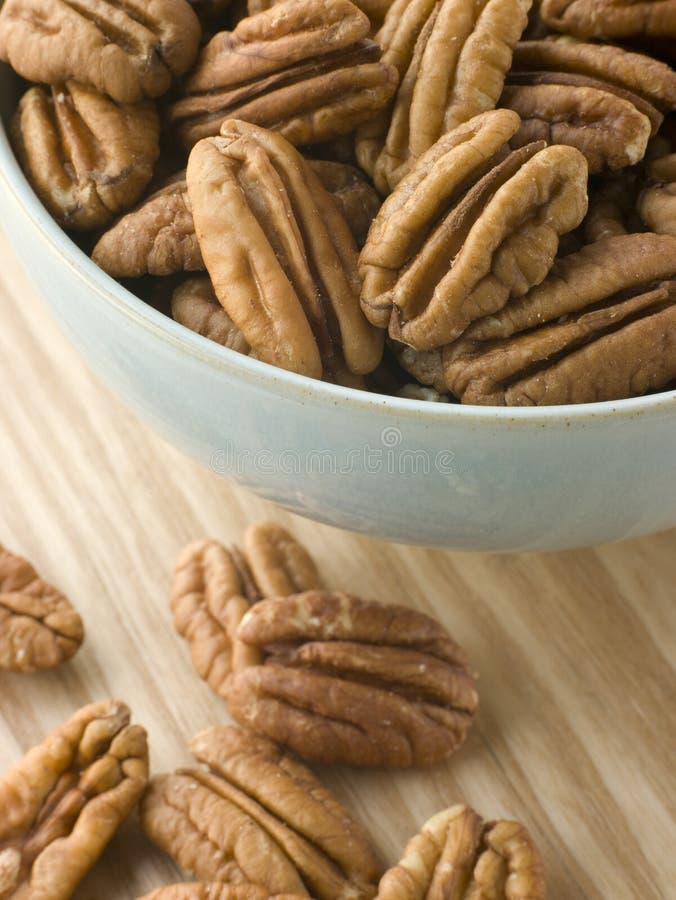 Bowl of Pecan Nuts stock photo. Image of food, pecans - 5574230