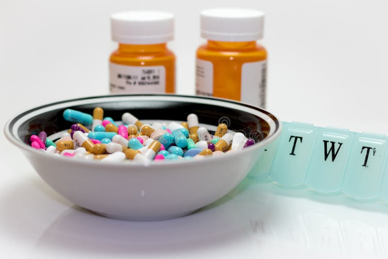 Bowl of Pills editorial photo. Image of pills, bowl, medication - 83345226