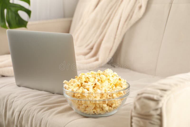 Bowl of Popcorn and Laptop on Sofa Watching Films Home Stock Photo ...