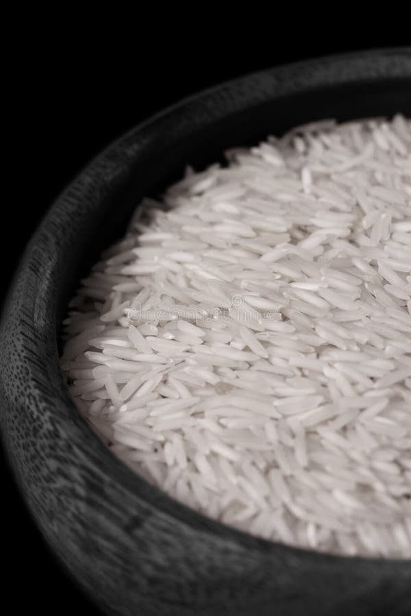 Bowl of Raw Rice in a Wooden Bowl. Stock Image - Image of long, crop ...