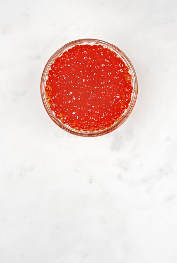 Bowl with Red Caviar on a Marble Table Stock Image - Image of macro ...