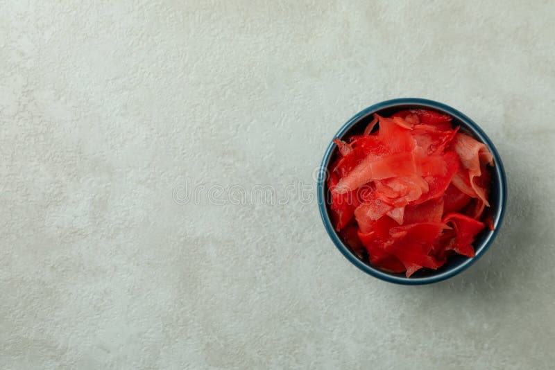 Bowl with Red Pickled Ginger on White Textured Background, Top View ...