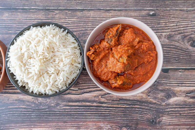 Bowl of Rice Served with Nigerian Pepper Tomato Stew Stock Photo ...