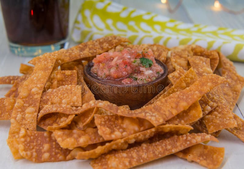 Bowl of Salsa and Chips with Napkin and Drink Stock Image - Image of ...