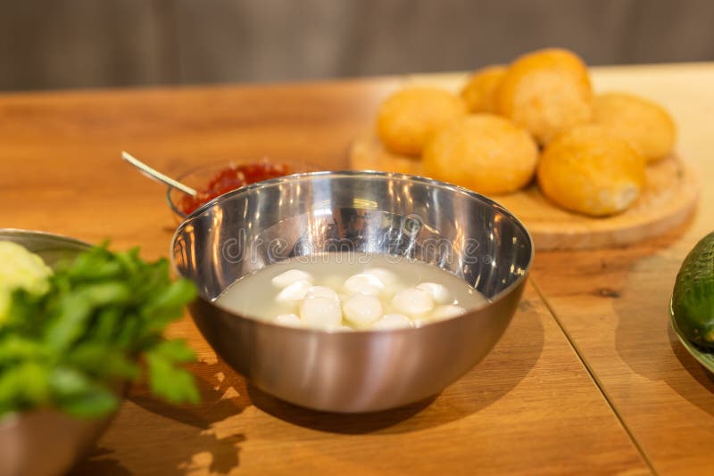 Bowl of Small Mozzarella Balls in Kitchen, Top View Stock Image - Image ...