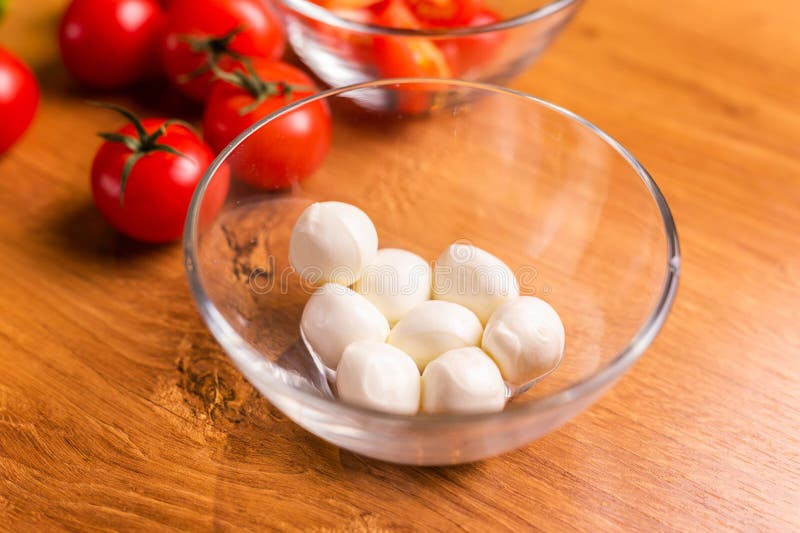 Bowl of Small Mozzarella Balls in Kitchen, Top View Stock Photo - Image ...