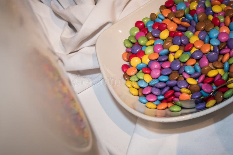 Bowl full of smarties stock photo. Image of brown, food - 129195126