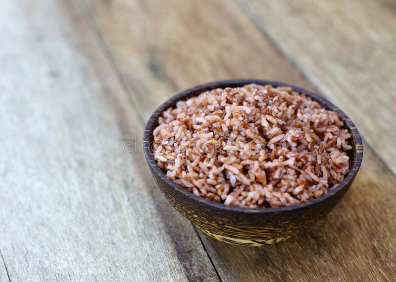 Bowl of Steam Red Cargo Rice on Wood Stock Image - Image of steamed ...