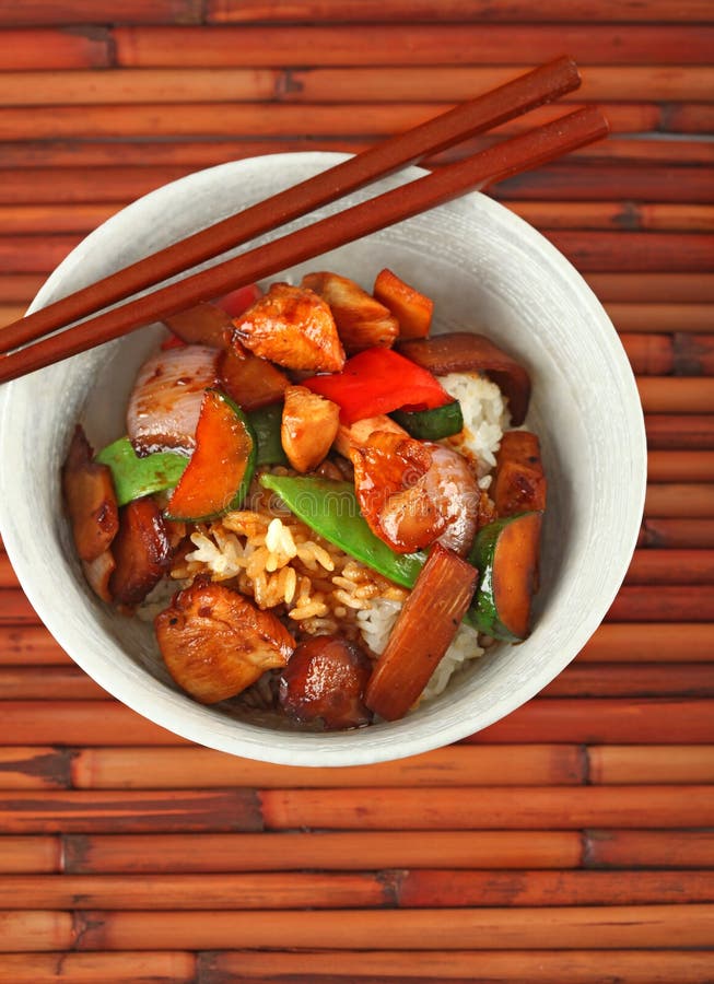 Bowl of Stewed Chicken Over White Rice Stock Photo - Image of sprout ...