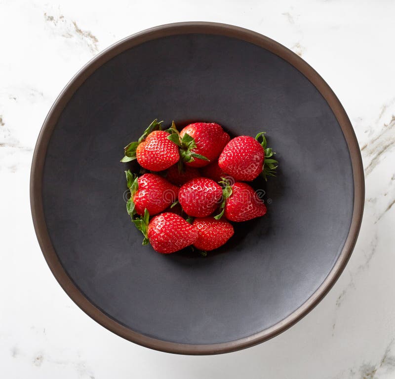 Bowl of Strawberry on Marble Table, from Above Stock Image - Image of ...