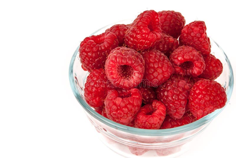 Bowl of Summer Raspberries stock photo. Image of nutritious - 46664456