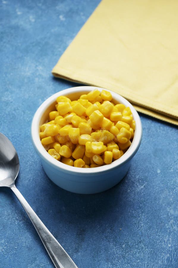 Bowl of Sweet Corn on Blue Background Stock Photo - Image of grain ...