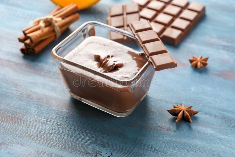 Bowl with Tasty Melted Chocolate on Wooden Table Stock Image - Image of ...