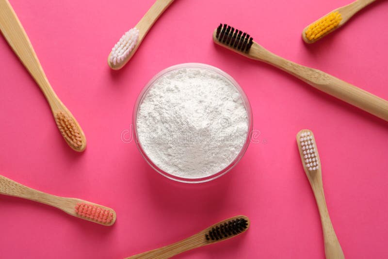 Bowl of Tooth Powder and Brushes on Pink Background, Flat Lay Stock ...