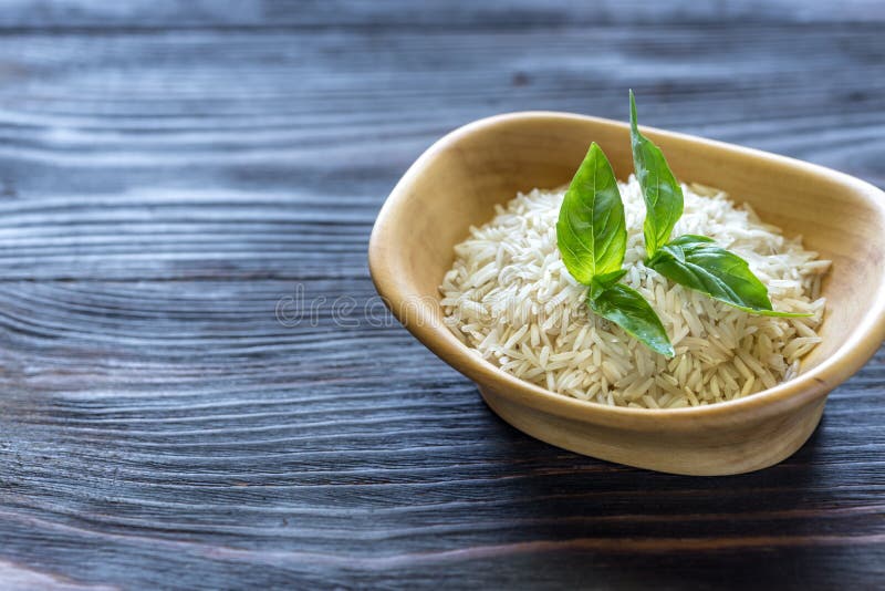 Bowl of Uncooked Basmati Rice Stock Photo - Image of basmati, indian ...