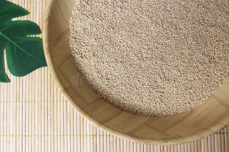 Bowl of Uncooked Millet with Leaf and Bamboo Mat Stock Photo - Image of ...