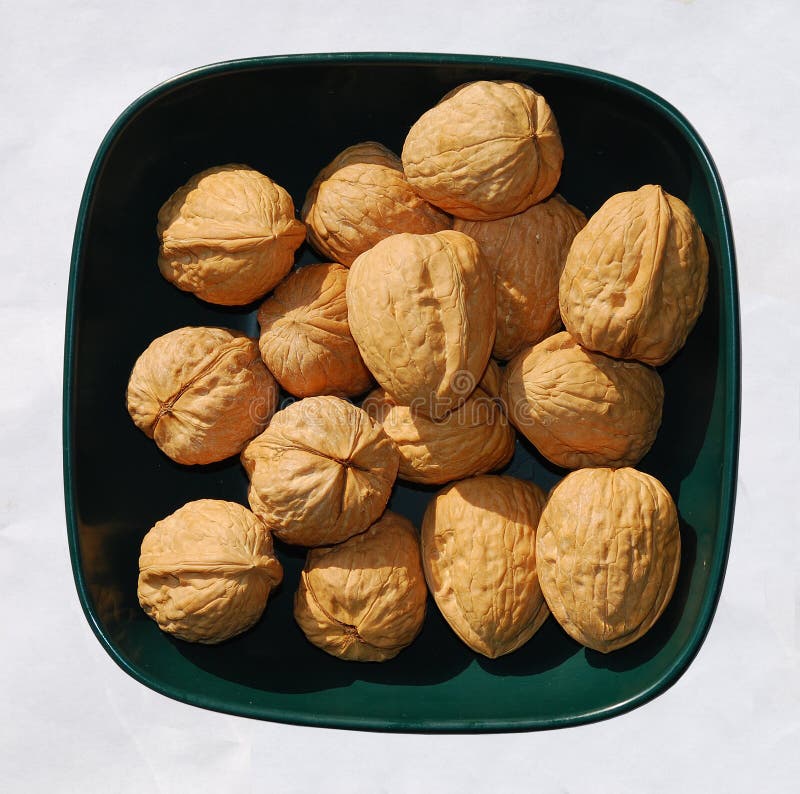 Bowl of Unshelled Walnuts stock image. Image of brown - 11007999