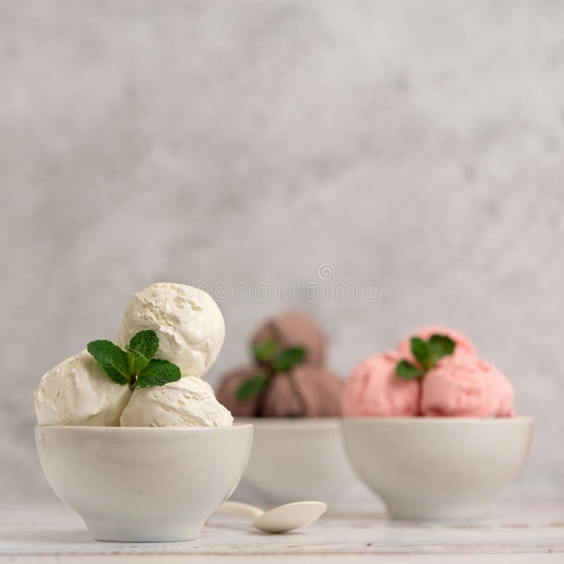 Bowl of Vanilla Ice Cream and Waffle Cones on Light Background. Side ...