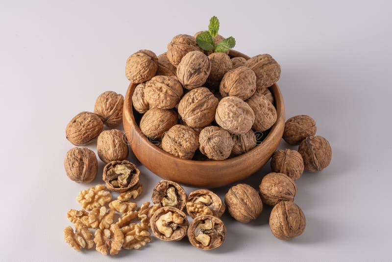 Bowl of Walnuts with Cracked Shells on White Background Stock Image ...