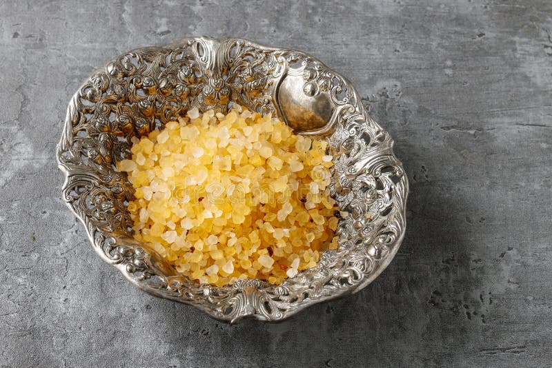 Bowl of yellow sea salt stock photo. Image of aromatherapy - 85722726