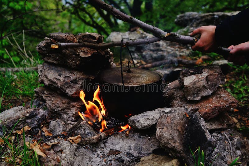 Bowler at the Stake, Cooking Stock Photo - Image of campfire, morning ...