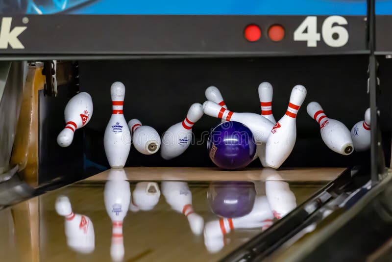 Ball Hitting Pins at a Bowling Alley Stock Image - Image of hobby ...
