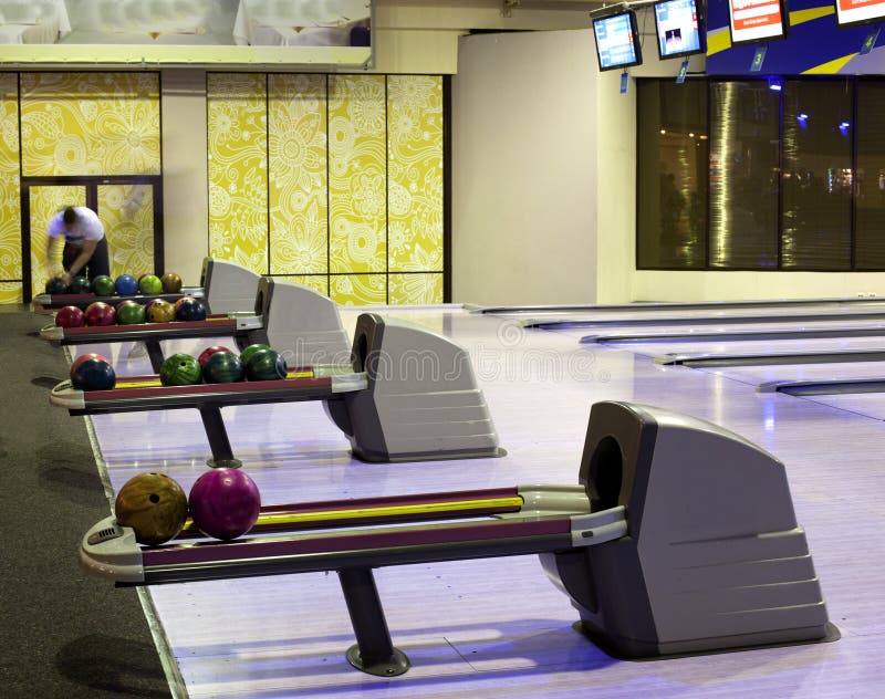 Bowling balls in a row stock image. Image of playful - 51364003