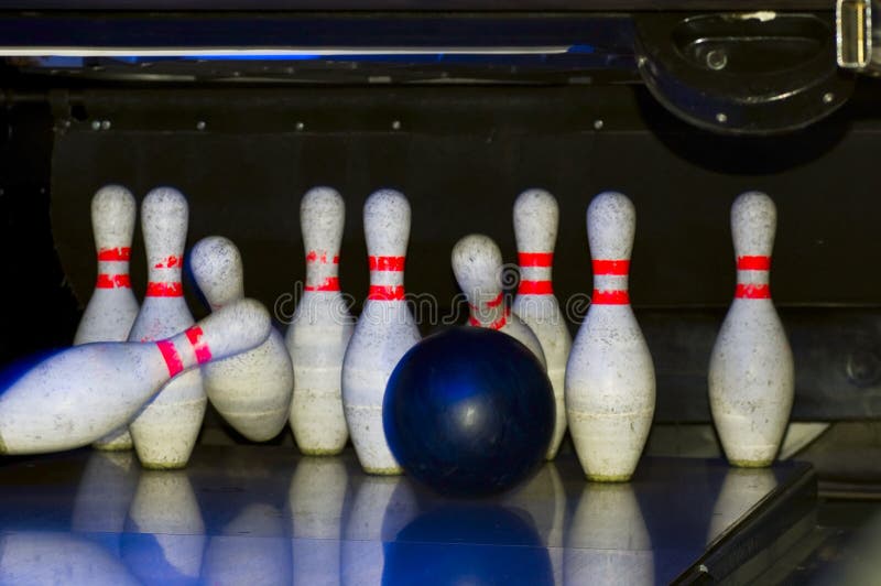 Bowling Ball and Falling Pins Stock Photo - Image of recreational, fall ...