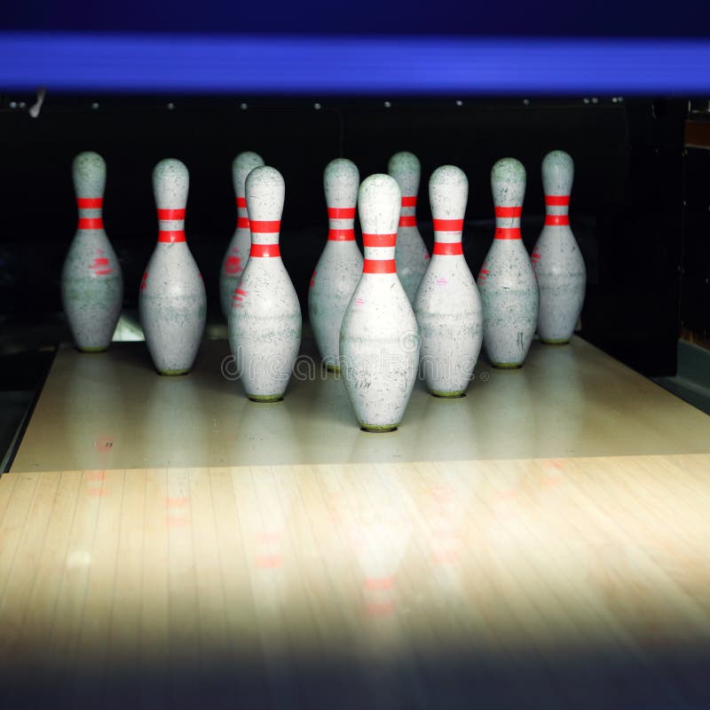 Bowling Ball and Falling Pins Stock Photo - Image of recreational, fall ...