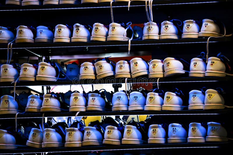 Bowling Shoes Rack with Different Sizes. Blue Lighting Stock Photo ...
