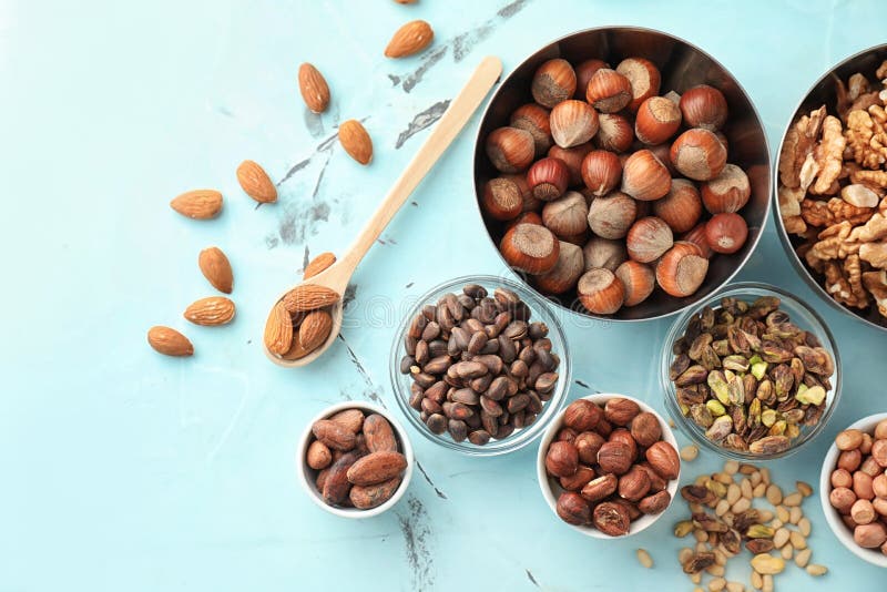 Bowls with Different Nuts on Table Stock Image - Image of peanuts ...