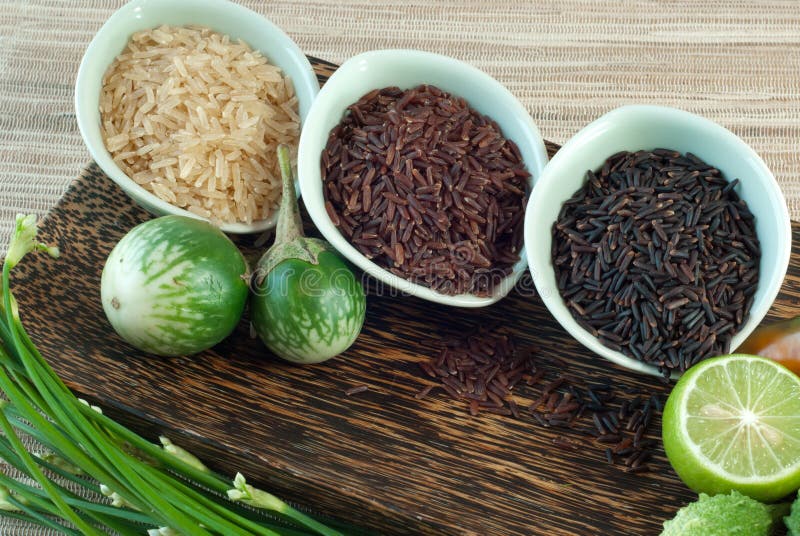 4 bowls of raw rice stock photo. Image of rattan, tableware - 31616182