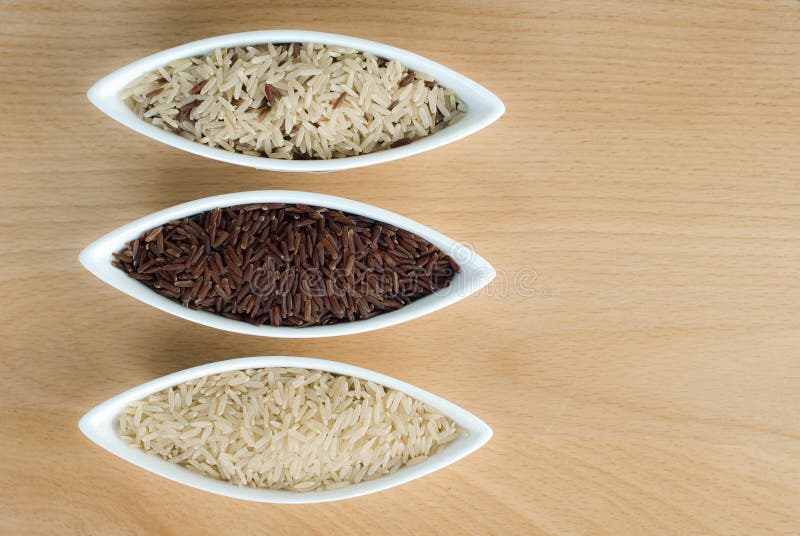 4 bowls of raw rice stock photo. Image of rattan, tableware - 31616182