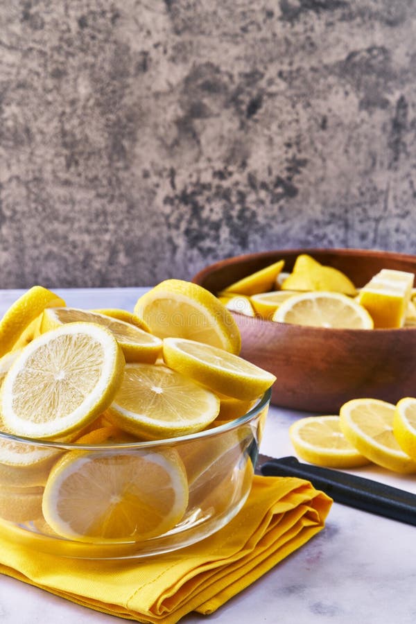Bowls of Slices of Lemon on a Marble Surface Stock Image - Image of ...