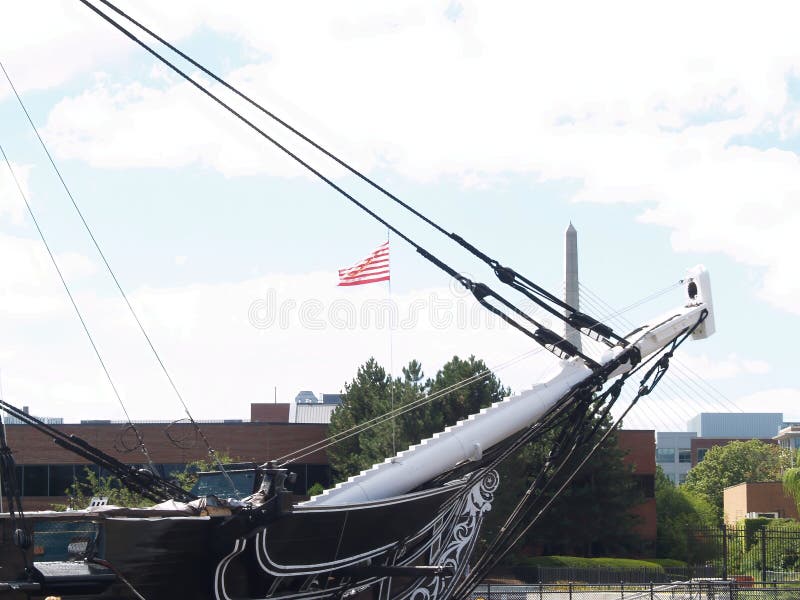 Bowsprit of the USS Constitution with Buildings and Bridge in ...