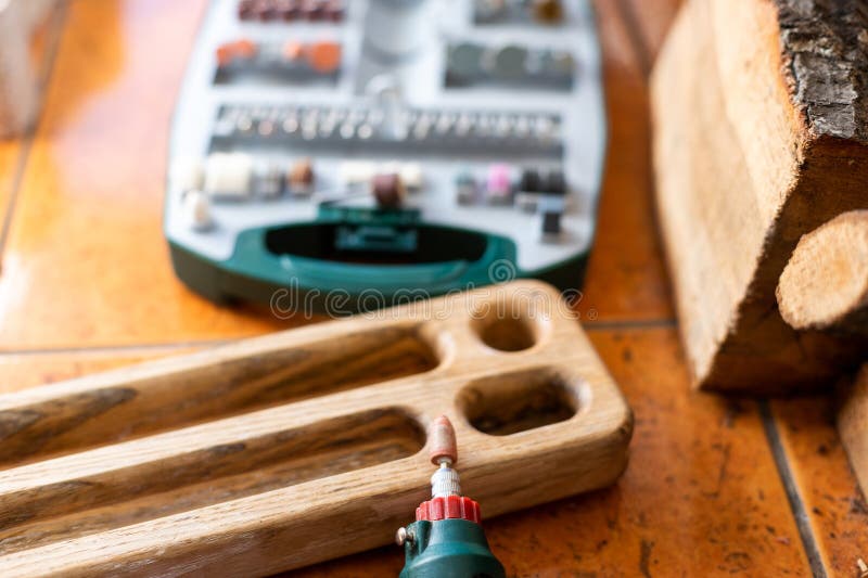 Box with Accessories for Processing and Engraving Next To an Electric ...