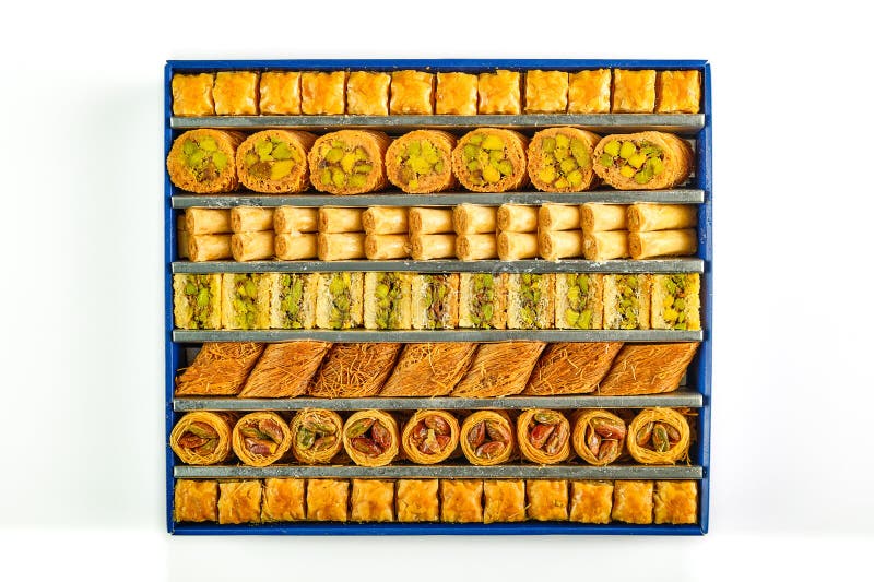 A Box of Assorted Arabic Sweets with Pistachios Stock Photo - Image of ...
