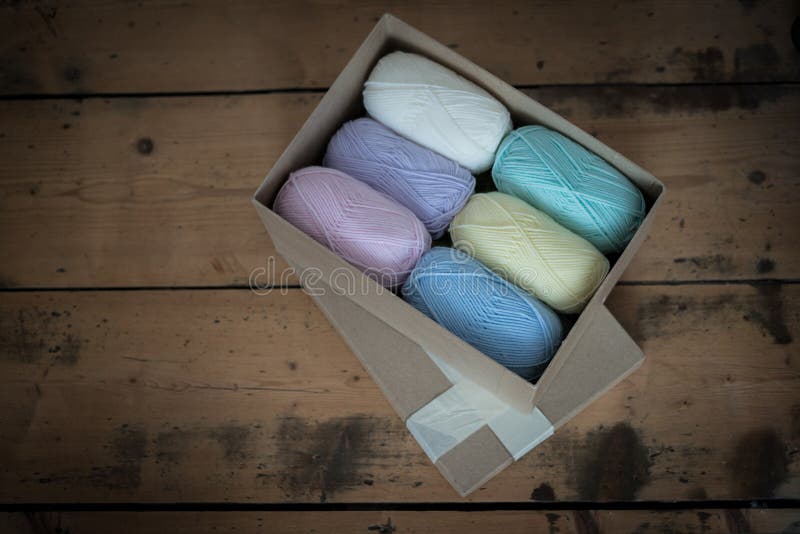 Box of Assorted Color Yarn on Wooden Surface Stock Photo - Image of ...