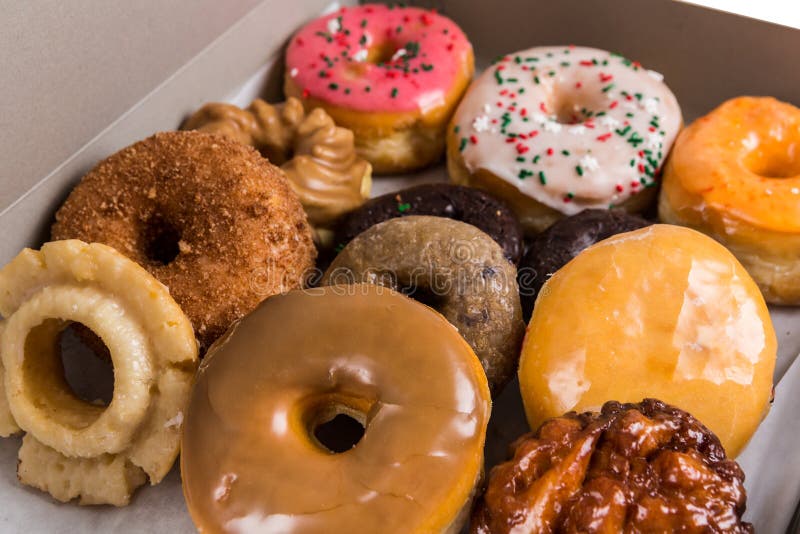 Box of assorted donuts stock image. Image of yeast, indulgence - 82731529