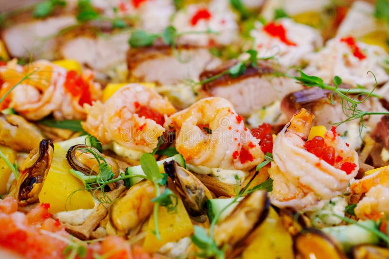 A Box with an Assortment of Meat and Fish Appetizers for the Buffet ...