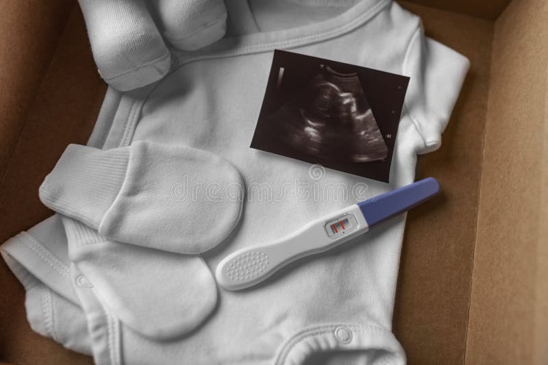 Box with Baby Stuff and Pregnancy Test. Stock Image - Image of gift ...