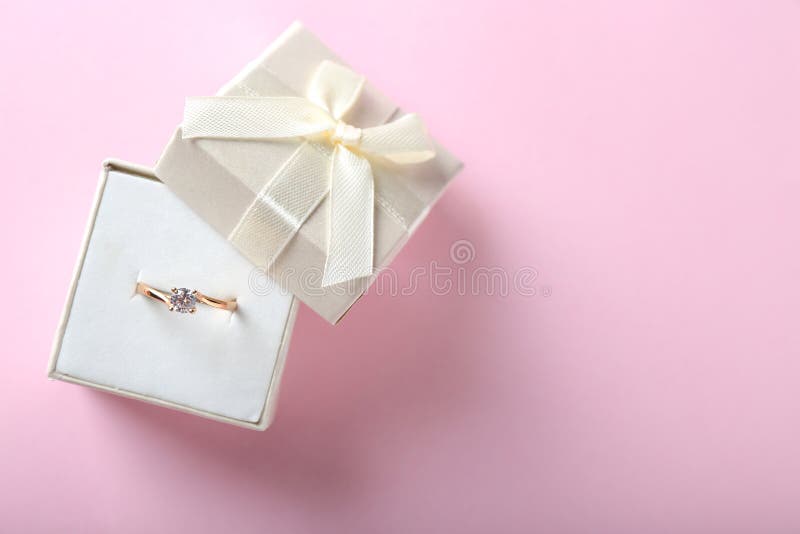 Box with Beautiful Engagement Ring on Color Background Stock Image ...