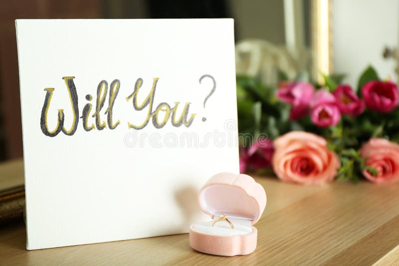 Box with Beautiful Engagement Ring on Wooden Table. Marriage Proposal ...