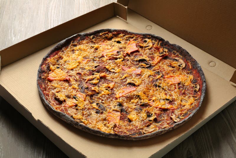 Black Pizza stock photo. Image of mollusk, herb, pizza - 13779760