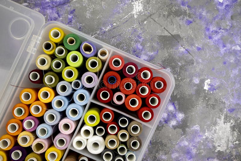 Box with Bright Colored Threads on an Abstract Background, Top View ...